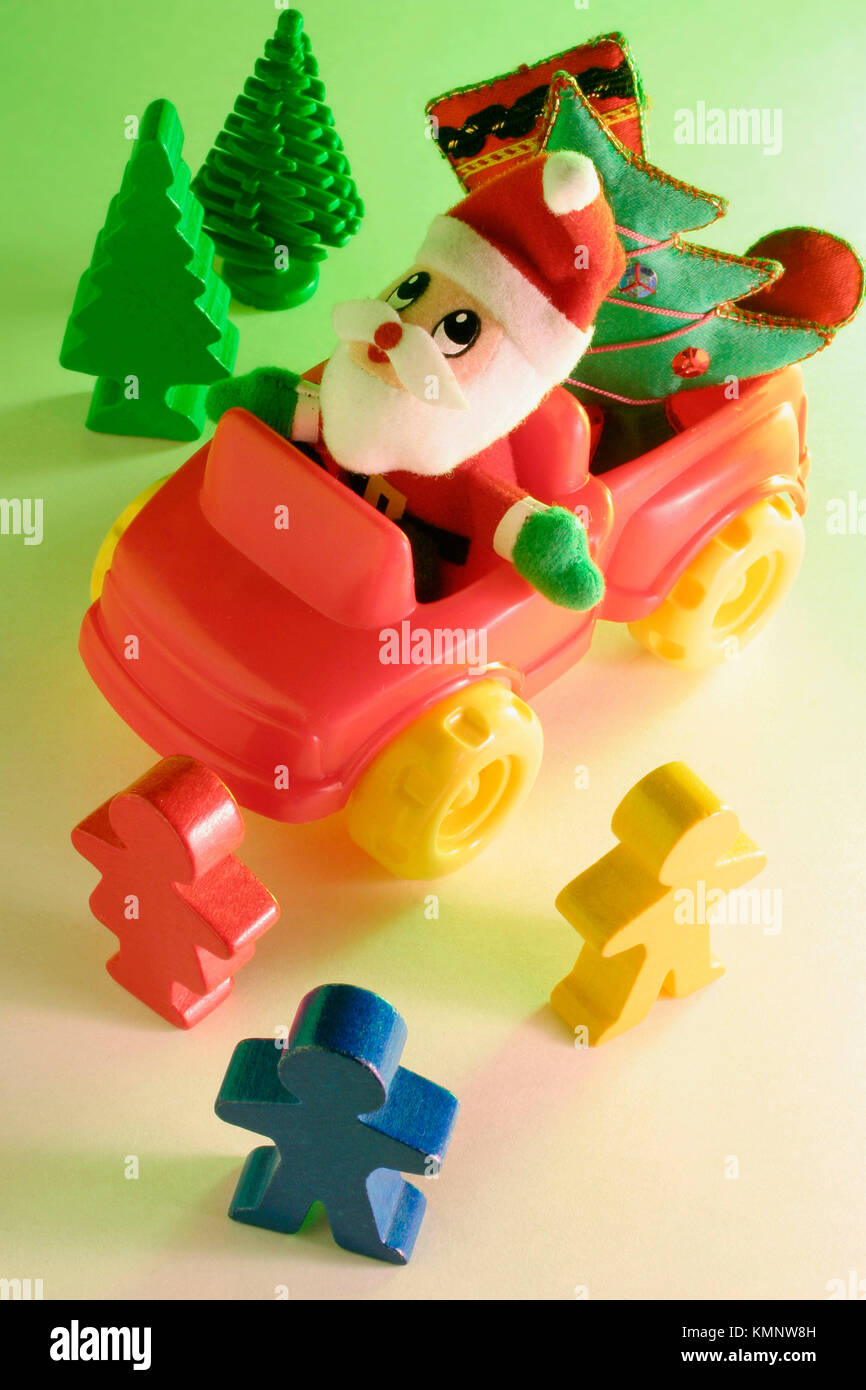 Toy Santa in car with gifts Stock Photo - Alamy