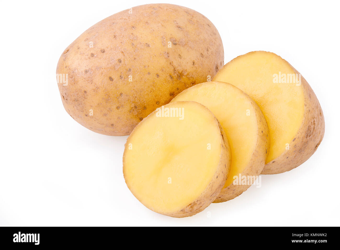 big raw potato tuber with slices isolated on white Stock Photo - Alamy
