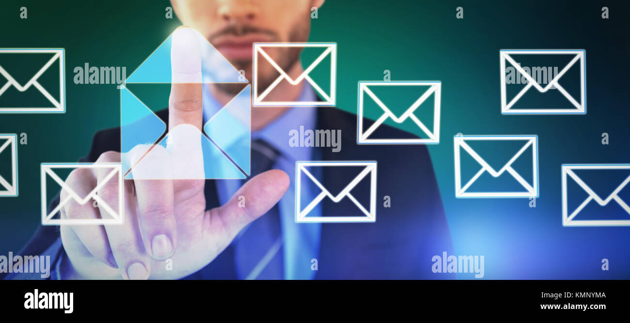 Mid section of mid adult businessman touching on invisible interface ...