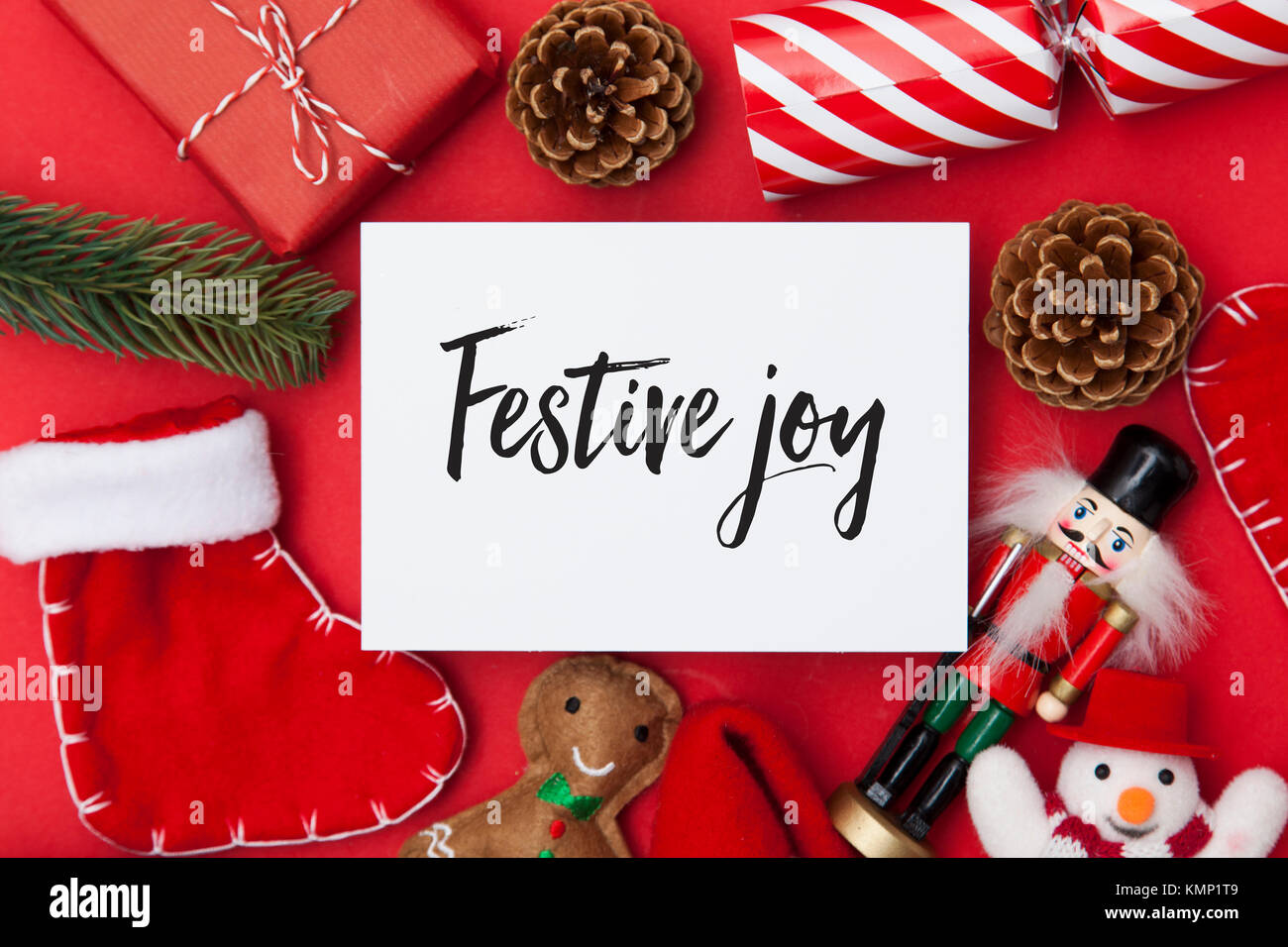 Festive message on white paper with a collection of Christmas ...