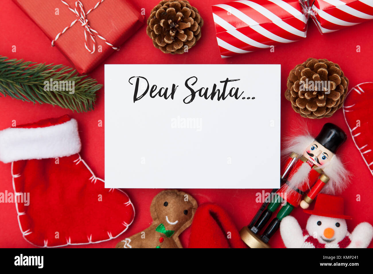 Festive message on white paper with a collection of Christmas ...