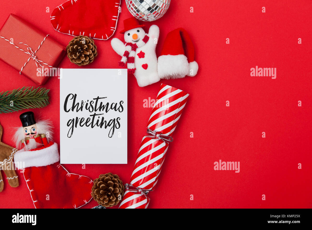 Festive message on white paper with a collection of Christmas ...
