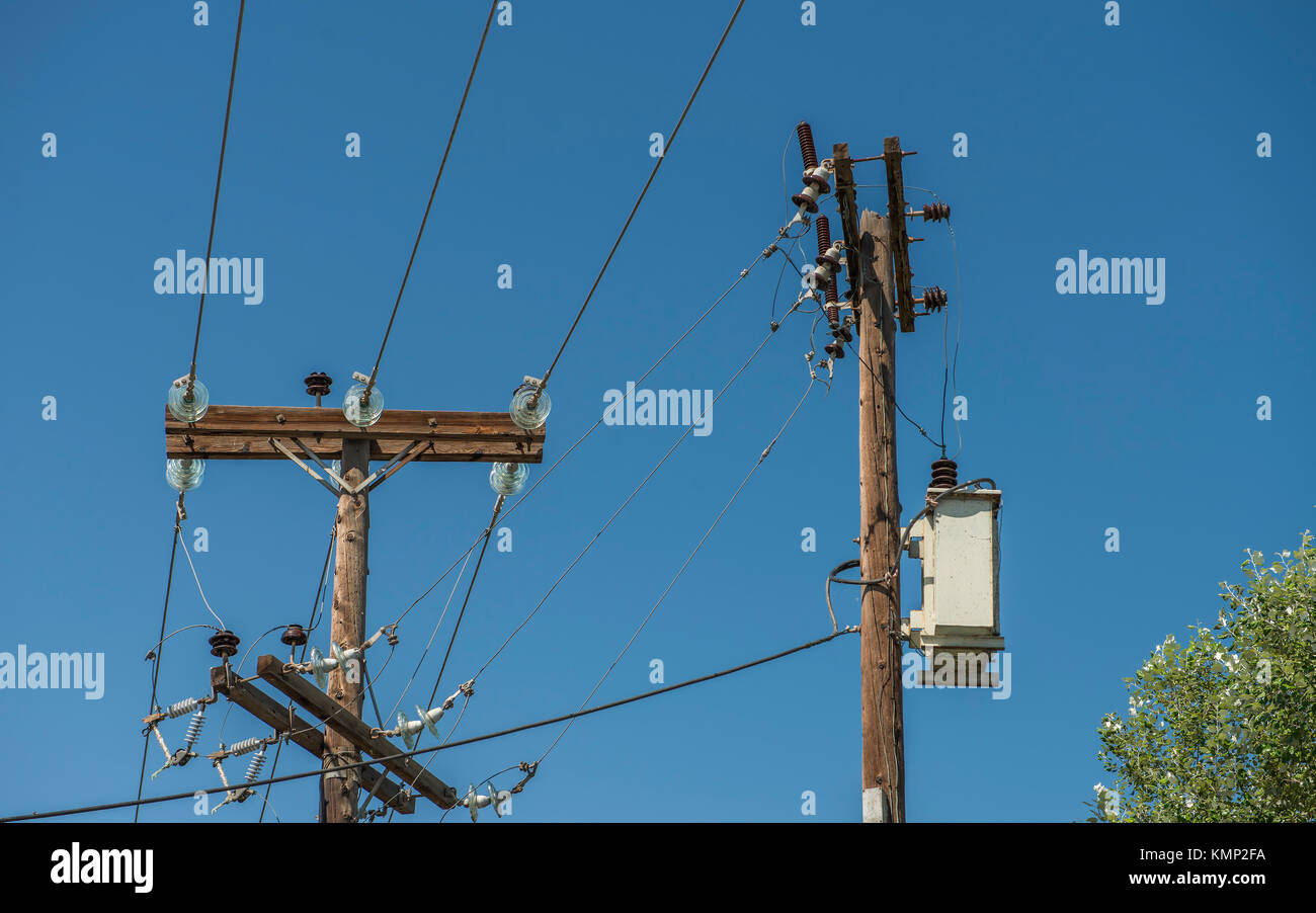 old wooden wire columns Stock Photo - Alamy