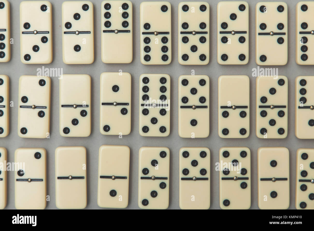 Domino background. Business strategy concept Stock Photo - Alamy