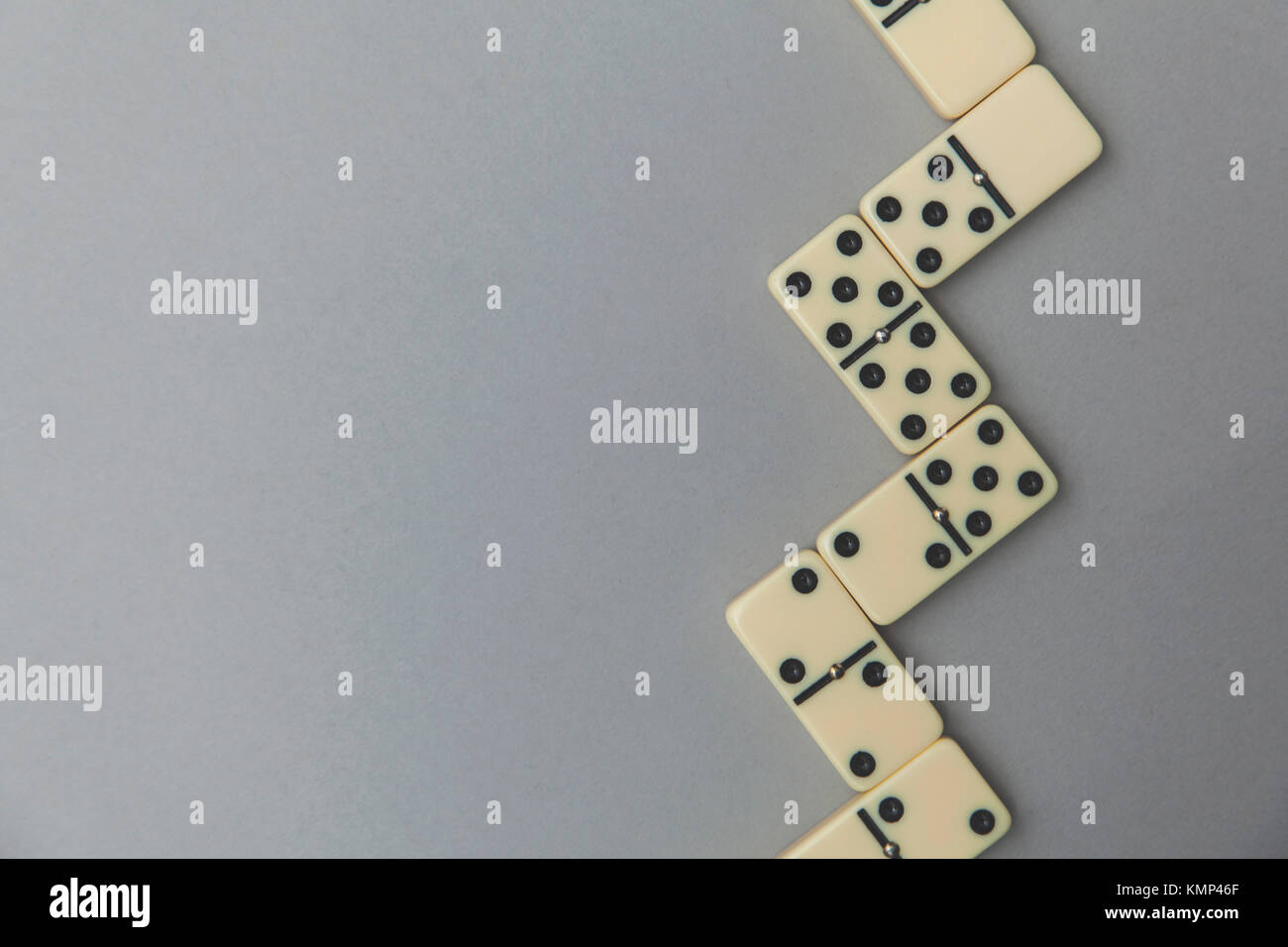 Domino background. Business strategy concept Stock Photo - Alamy