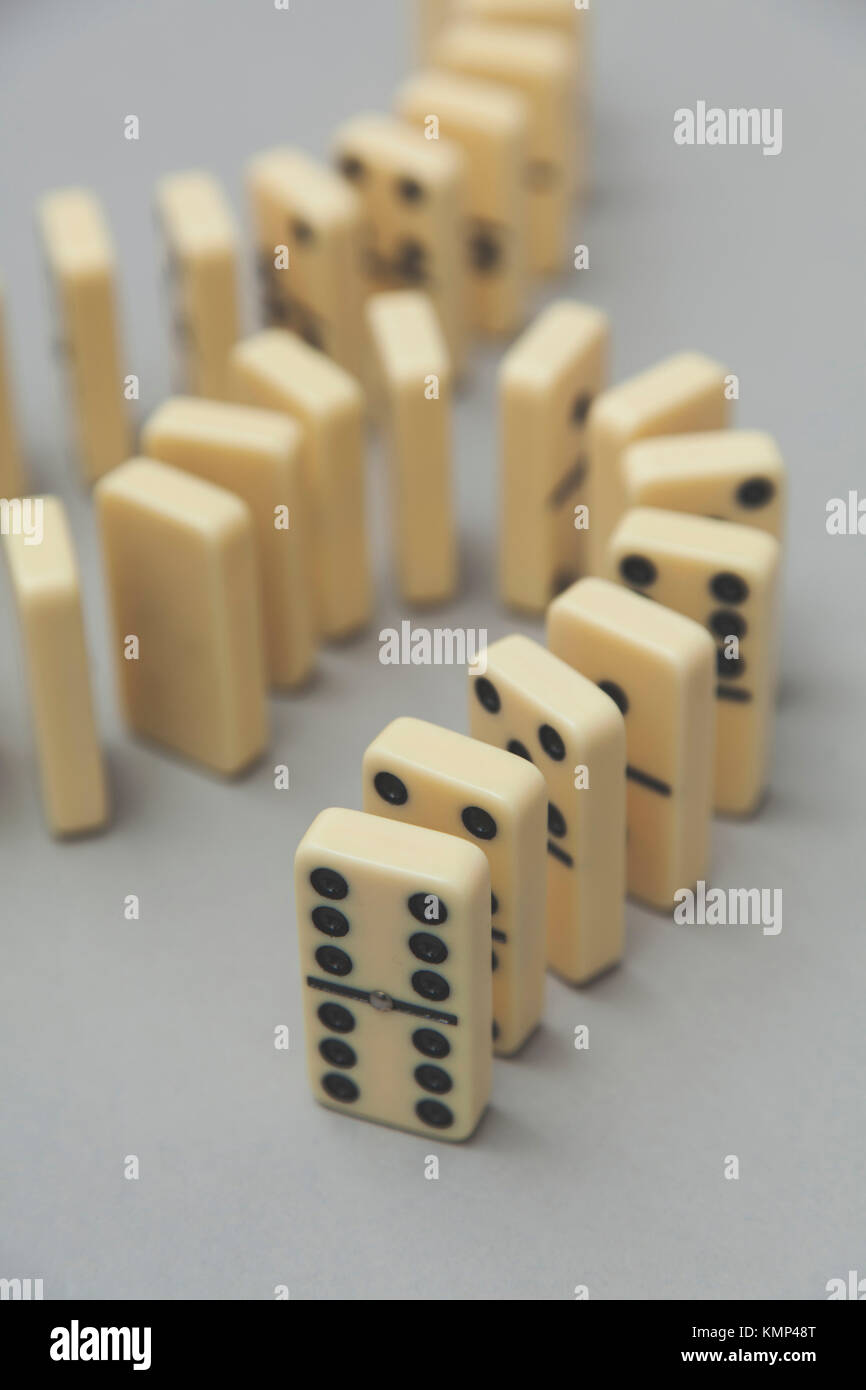 Domino background. Business strategy concept Stock Photo - Alamy