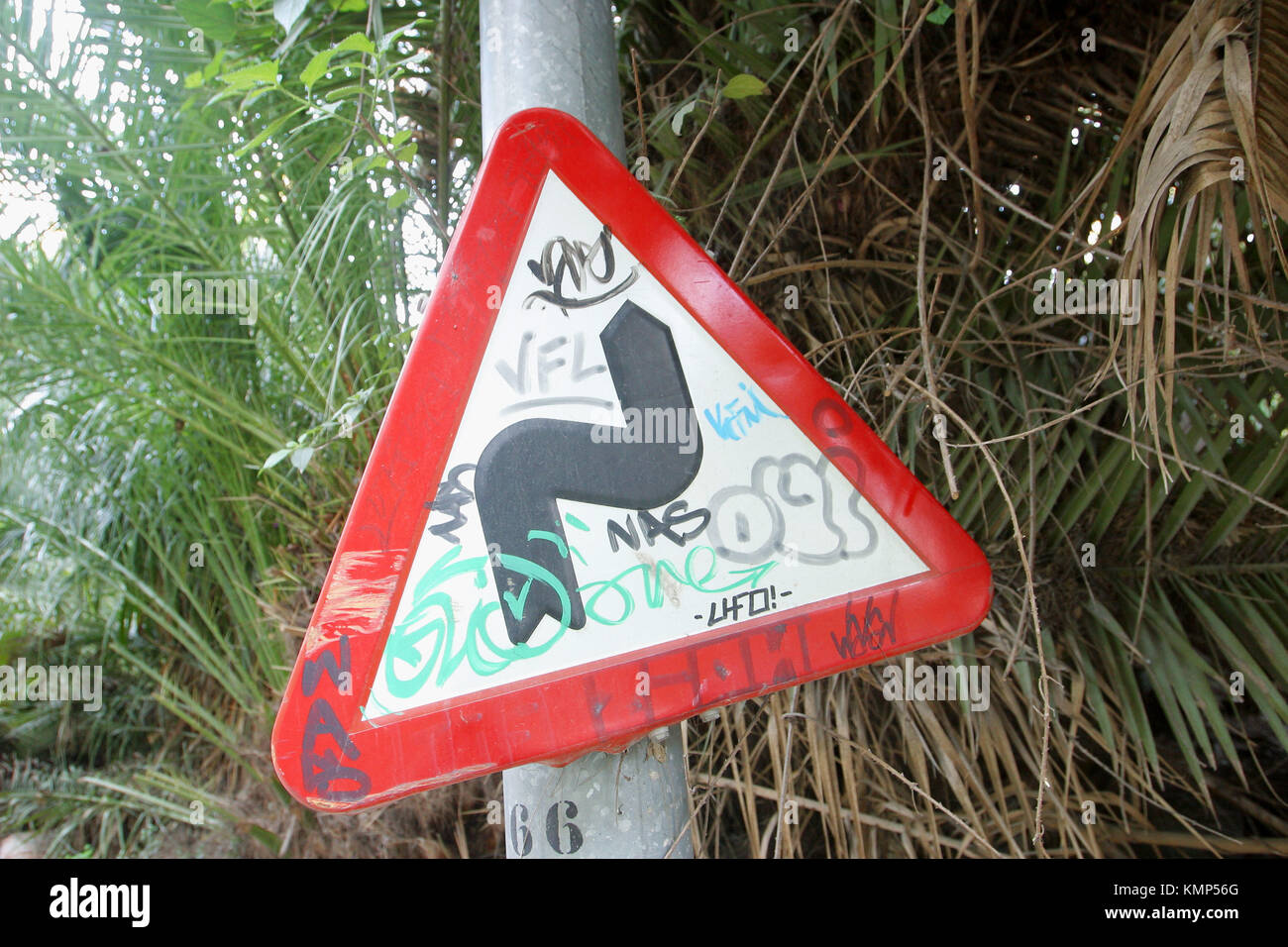 Double bend warning road sign hi-res stock photography and images - Alamy