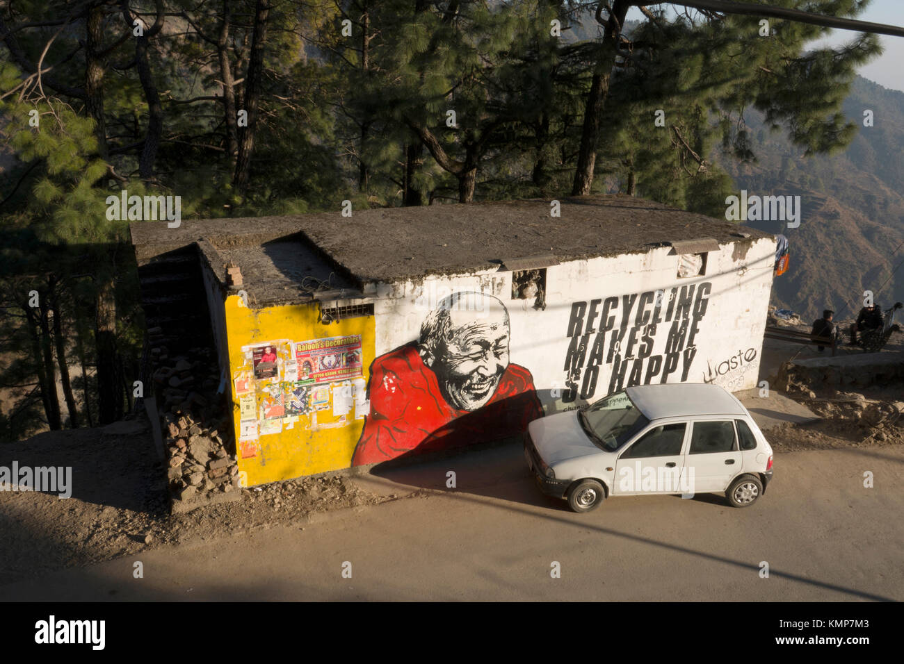 Mural on side of building depicting Tibetan monk with recycling message ...