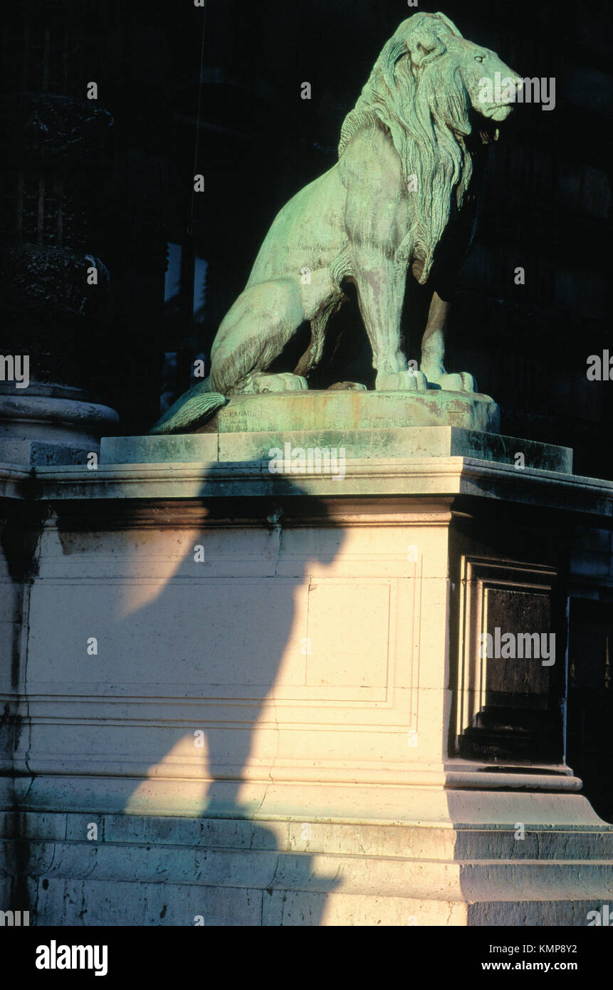 Lions at the entrance to Louvre Museum. Paris. France Stock Photo - Alamy