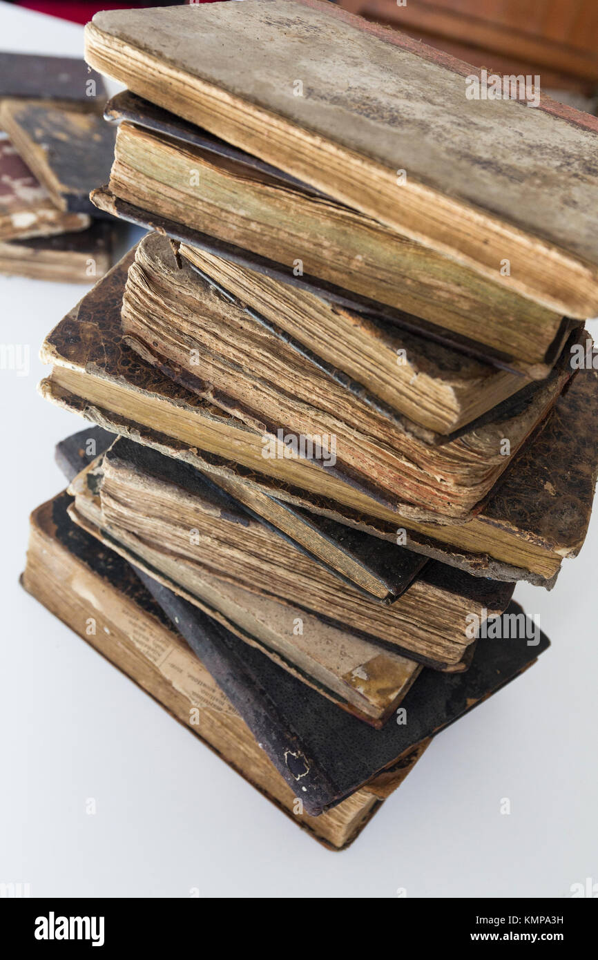 Old books stacked on top of one another Stock Photo - Alamy
