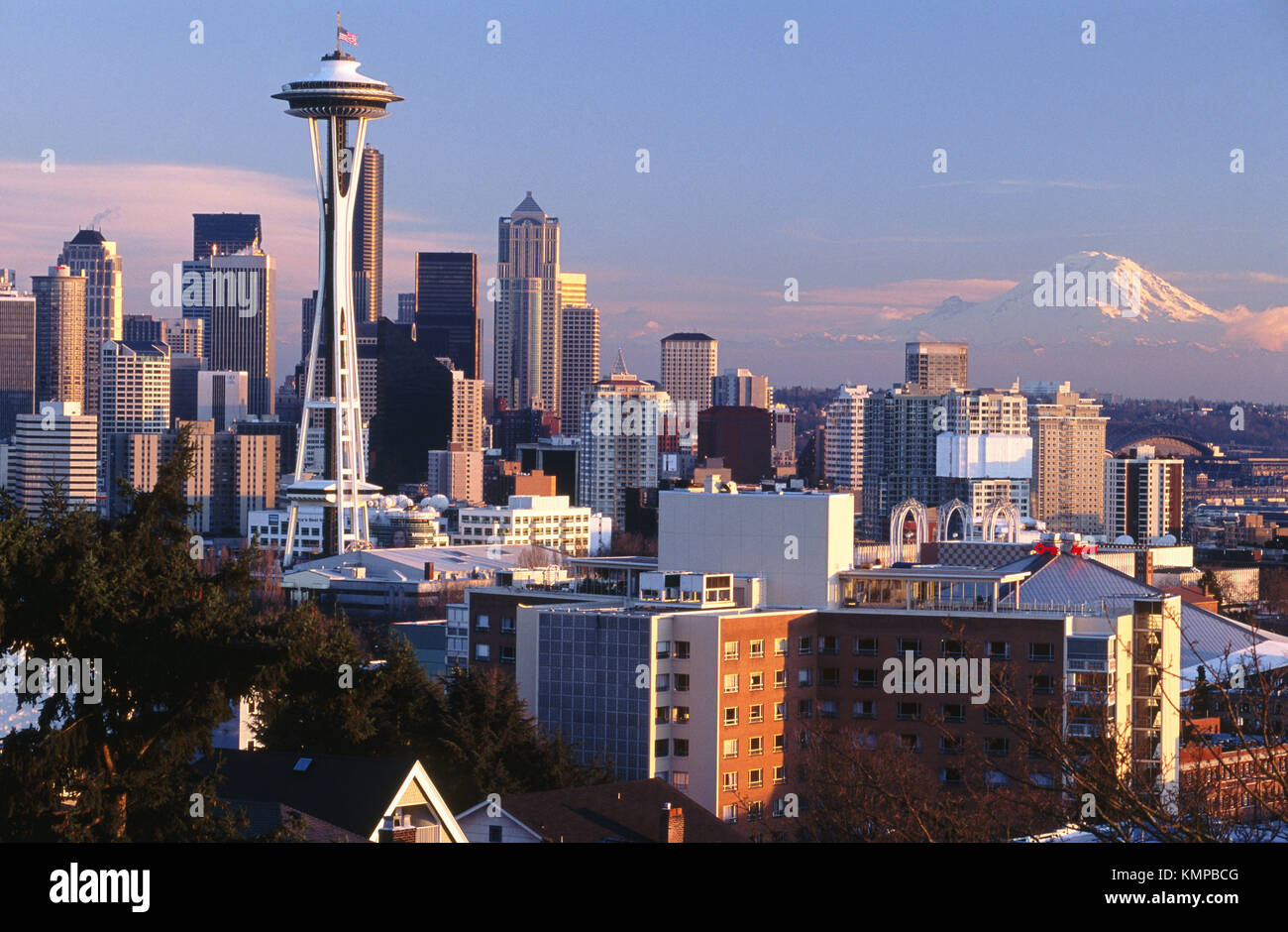 The Needle, city symbol and downtown buildings. Mount Rainier at the ...