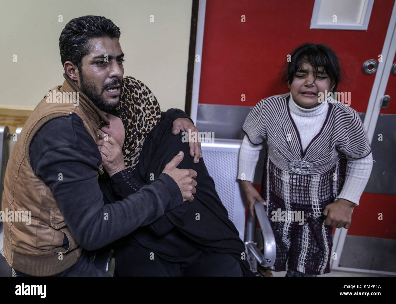 Relatives mourn the death of Maher Attala at the Indonesian hospital in ...