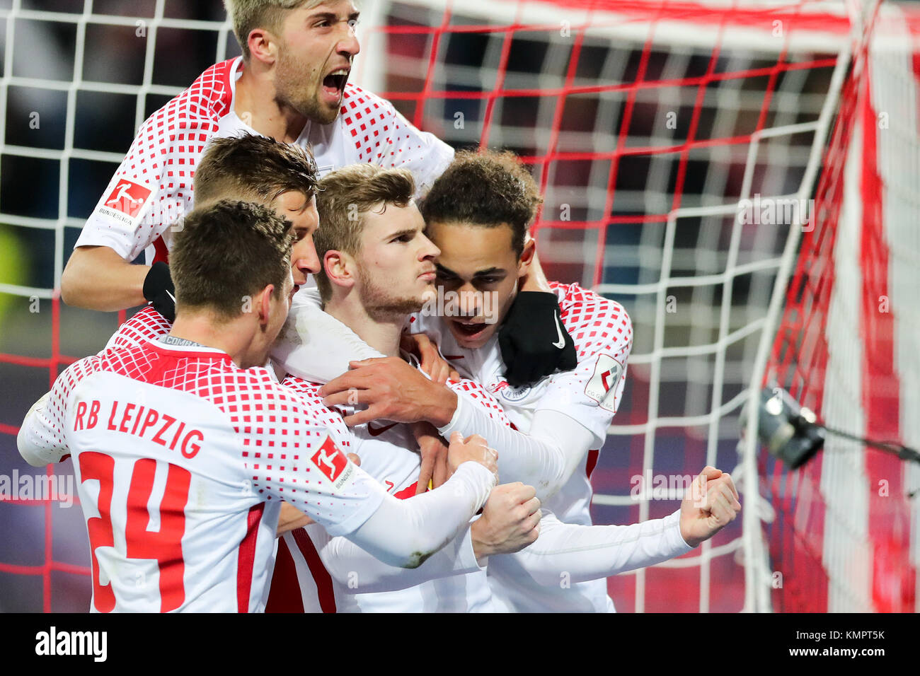 Leipzig, Germany. 9th Dec, 2017. Leipzig's players celebrate with Timo ...