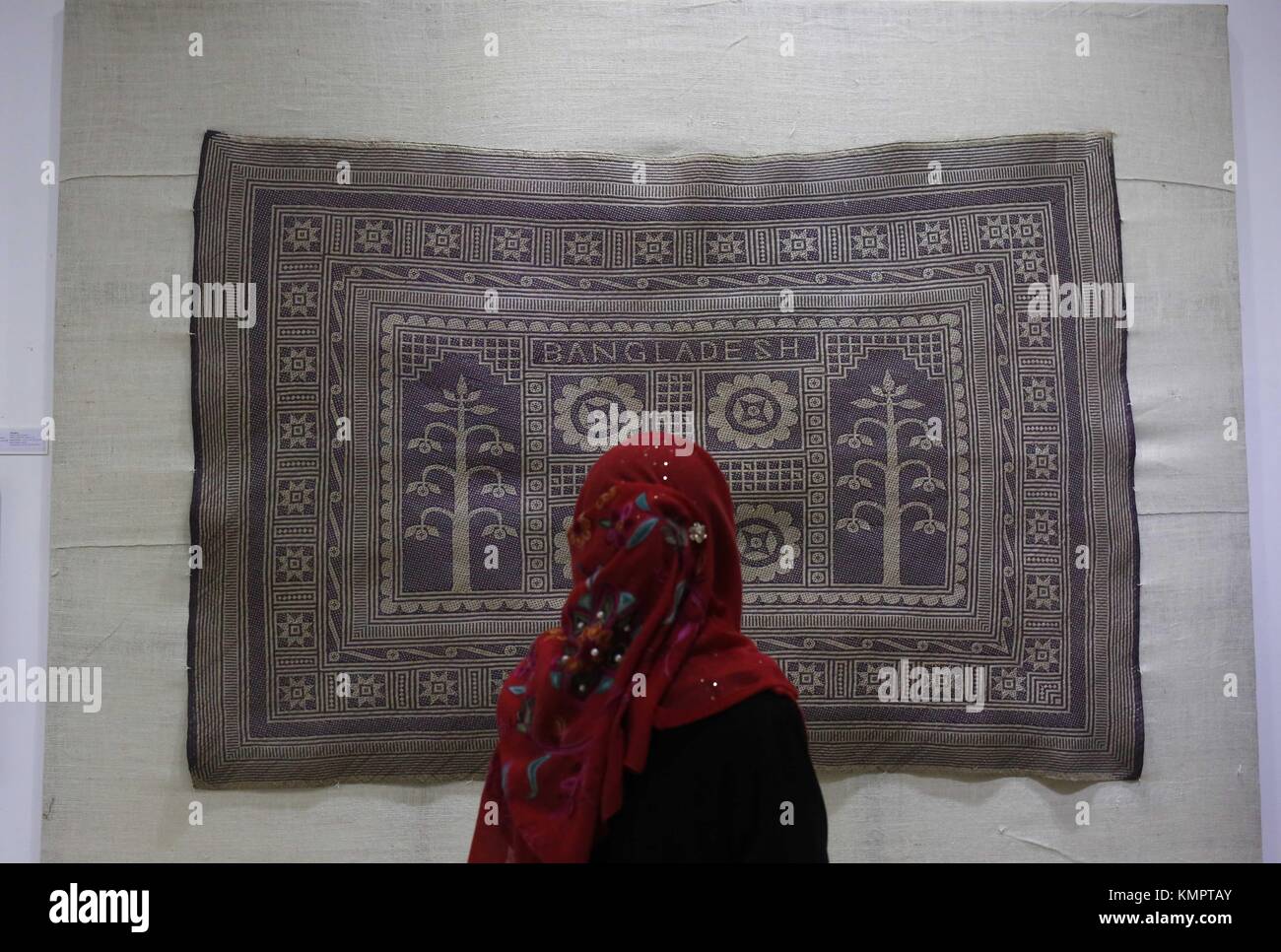 Dhaka, Bangladesh. 9th Dec, 2017. A visitor comes to an exhibition on ...