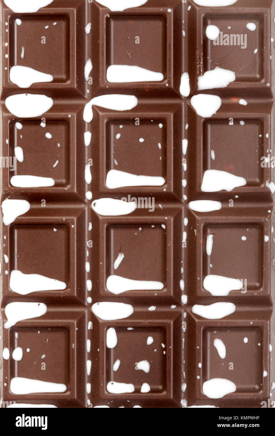 Chocolate tile with milk splashes Stock Photo - Alamy
