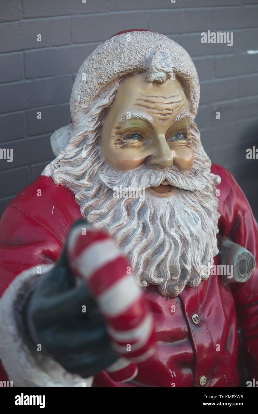 Large Santa Claus with candy cane Stock Photo - Alamy