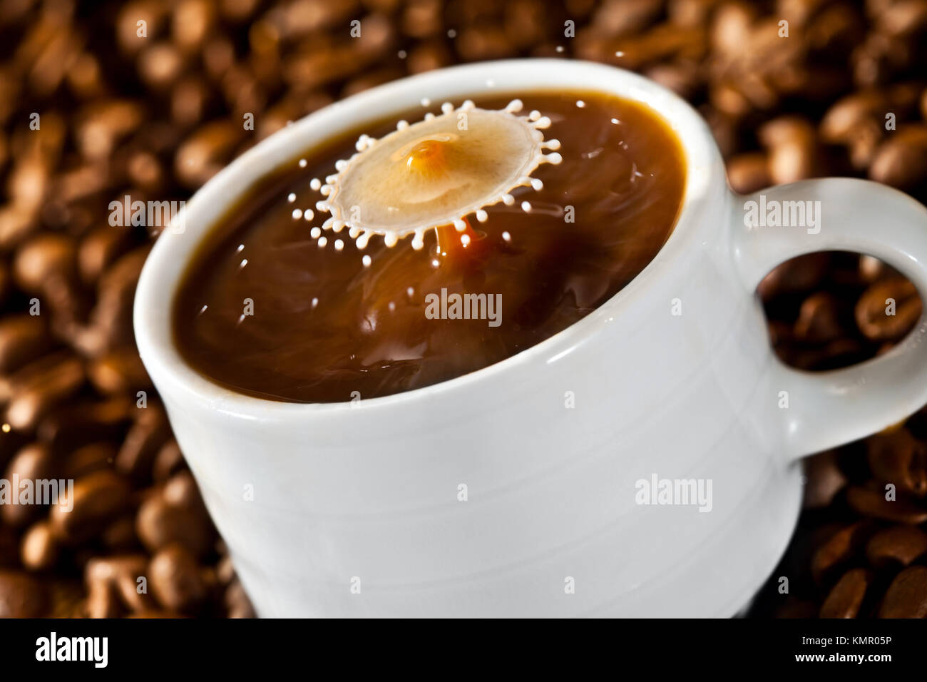 Fresh coffee drops falling cup hi-res stock photography and images - Alamy
