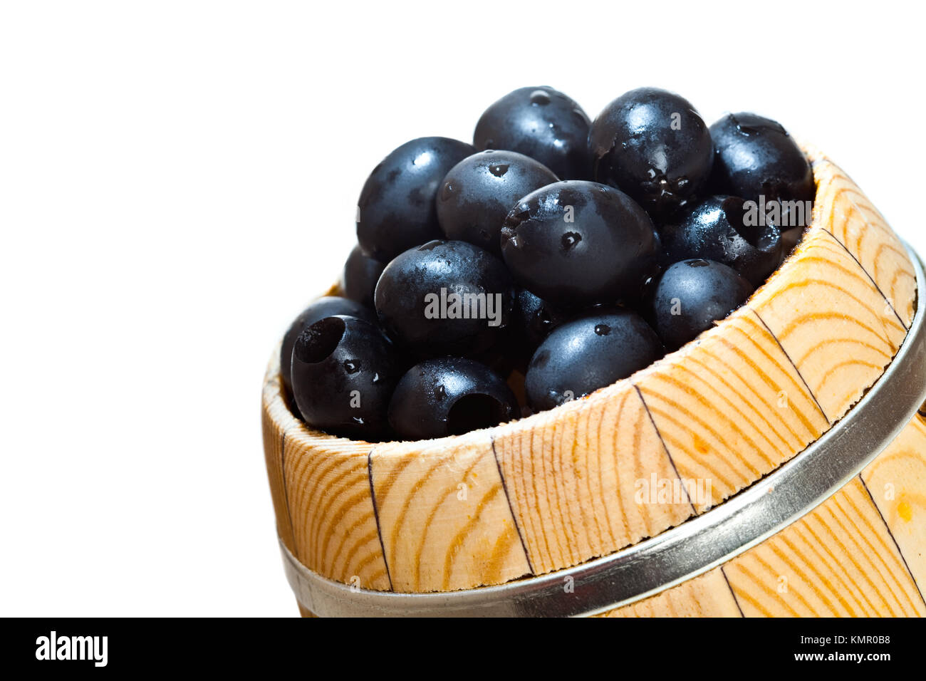 olive in small barrel on a white background Stock Photo - Alamy