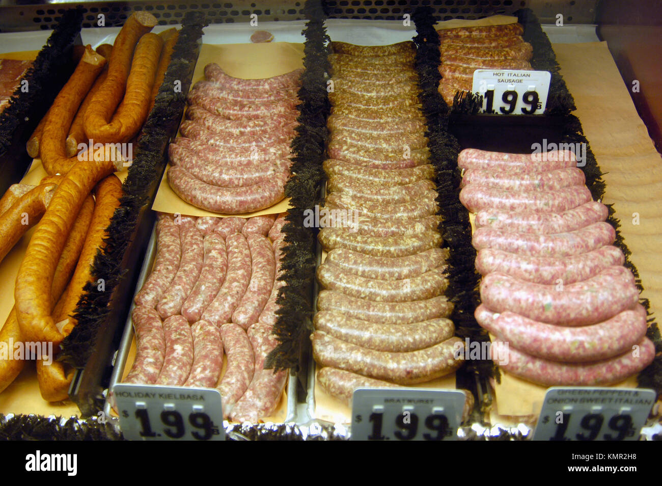 Fresh meat on display in a store Stock Photo - Alamy