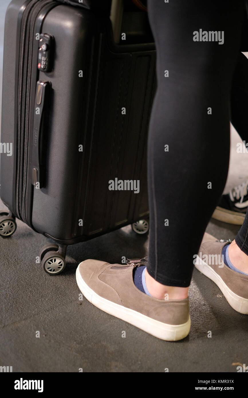 December 2017 - Feet and suitcase belonging to a you woman or teenage ...