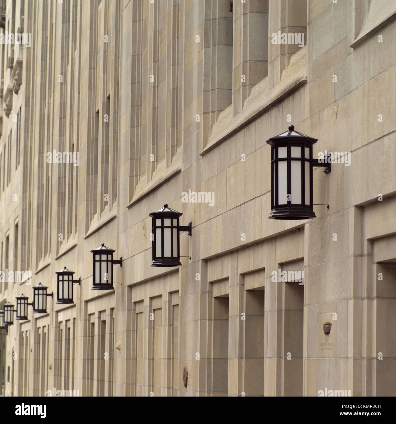 Chicago, Illinois, Street lamps on a wall of a Chicago Tribune Building ...