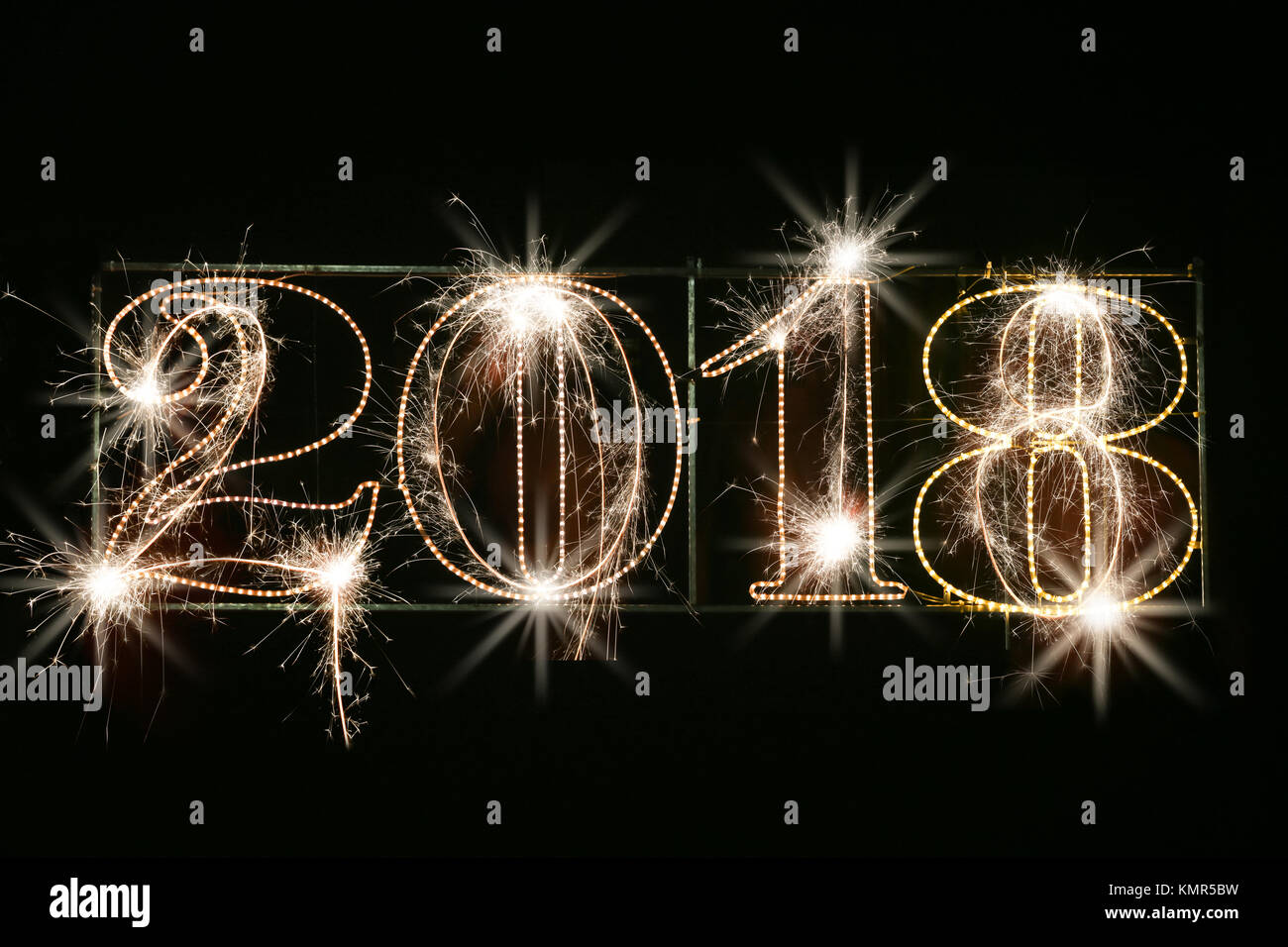 Isolated 2018 sign written with sparkle firework on black background ...