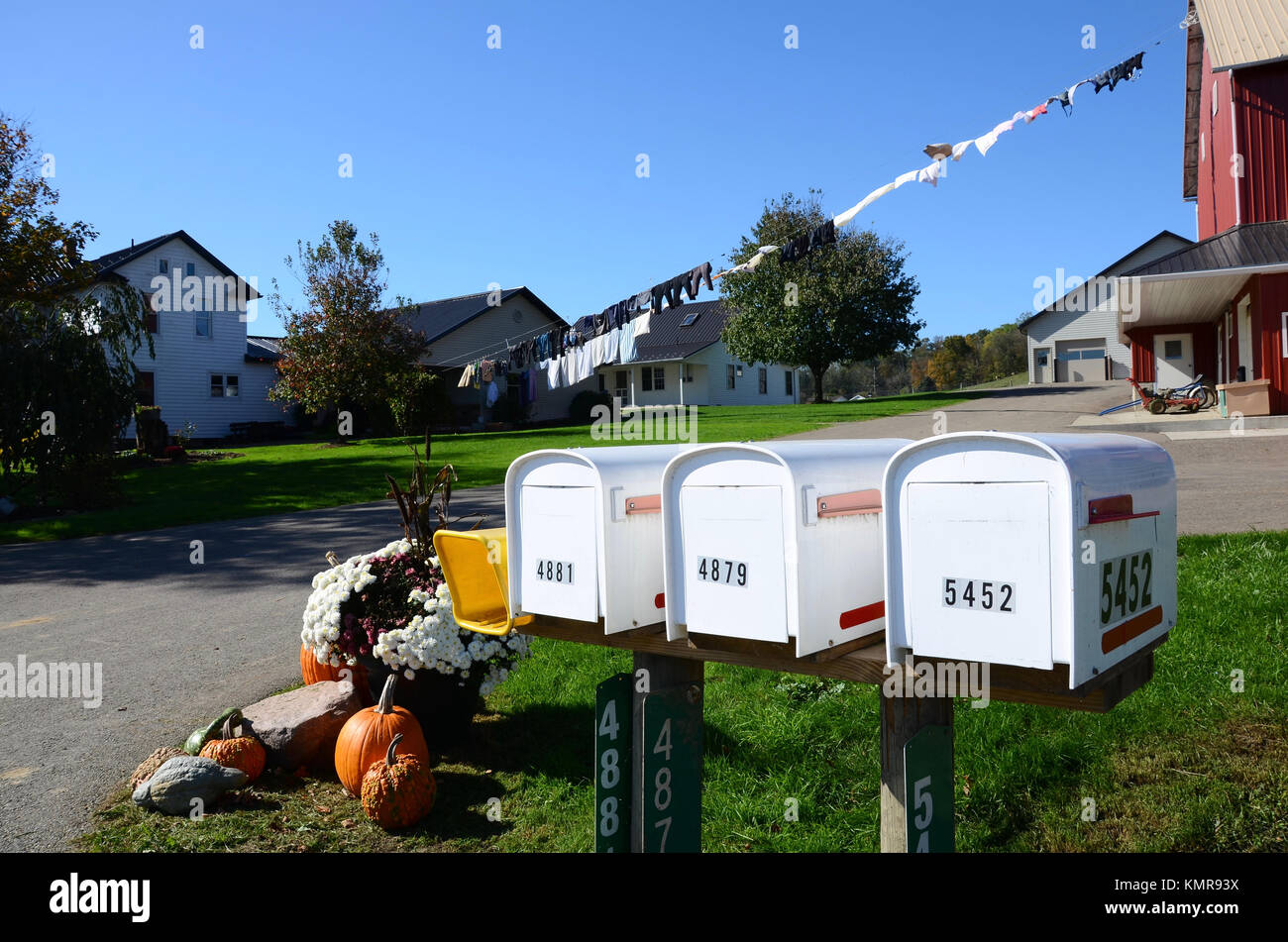 Laundry drying on a washing line hung from the barn of an Amish ...