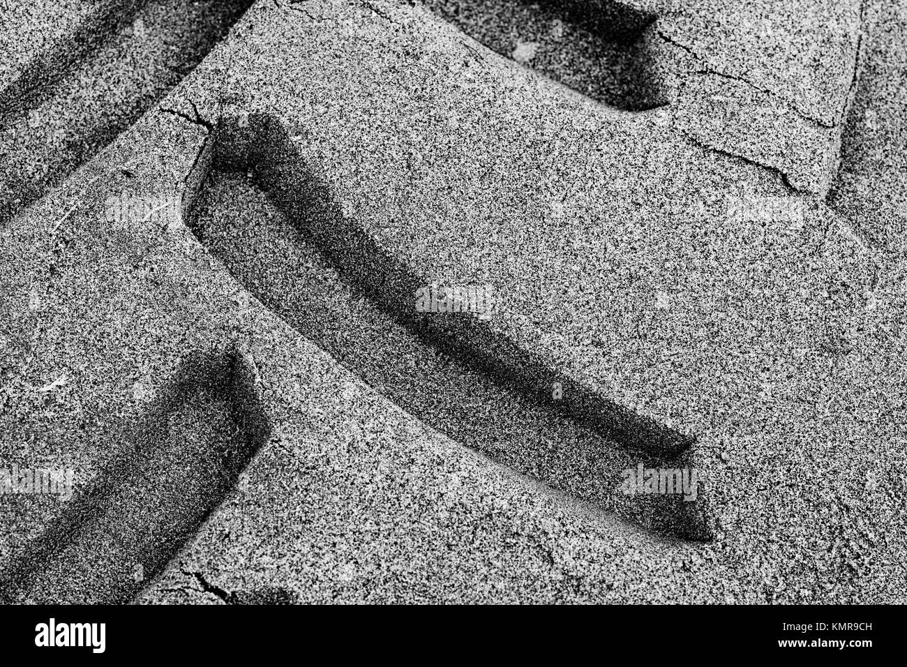 Deep tracks in the wet sand Stock Photo - Alamy