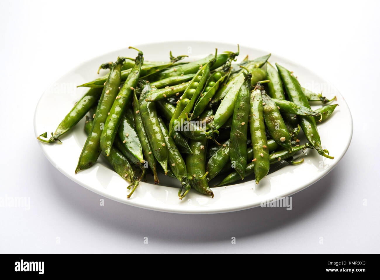 Spicy fried Green Peas pod or chatpata matar falli Stock Photo - Alamy