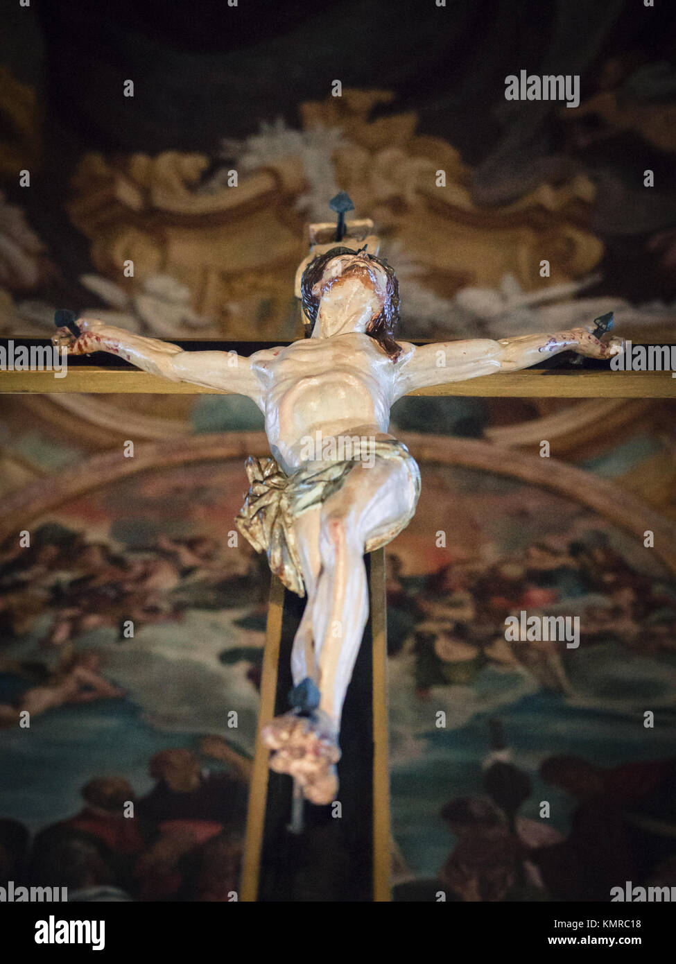 Lonigo, Italy - August 8, 2017: Statue of Jesus crucified in an ancient ...