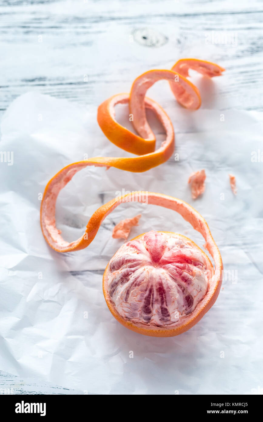 Peeled grapefruit on the table Stock Photo - Alamy