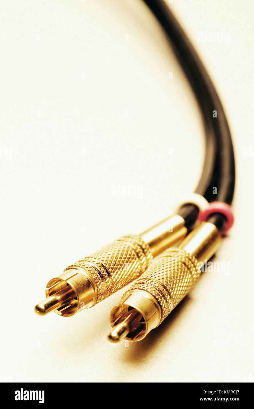 Dual gold stereo connecting cords Stock Photo - Alamy