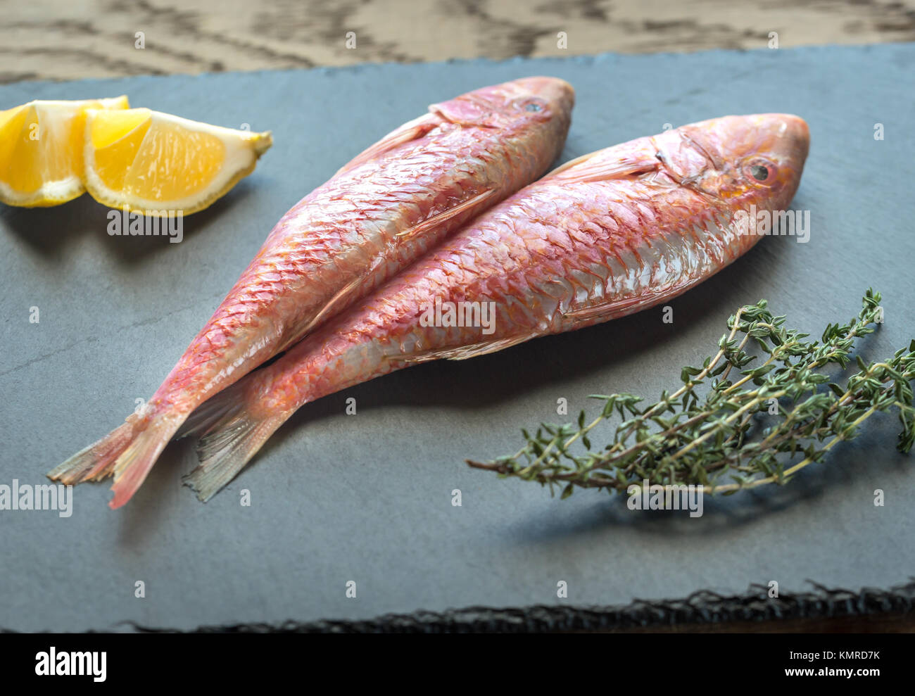 Raw red mullet with ingredients Stock Photo - Alamy