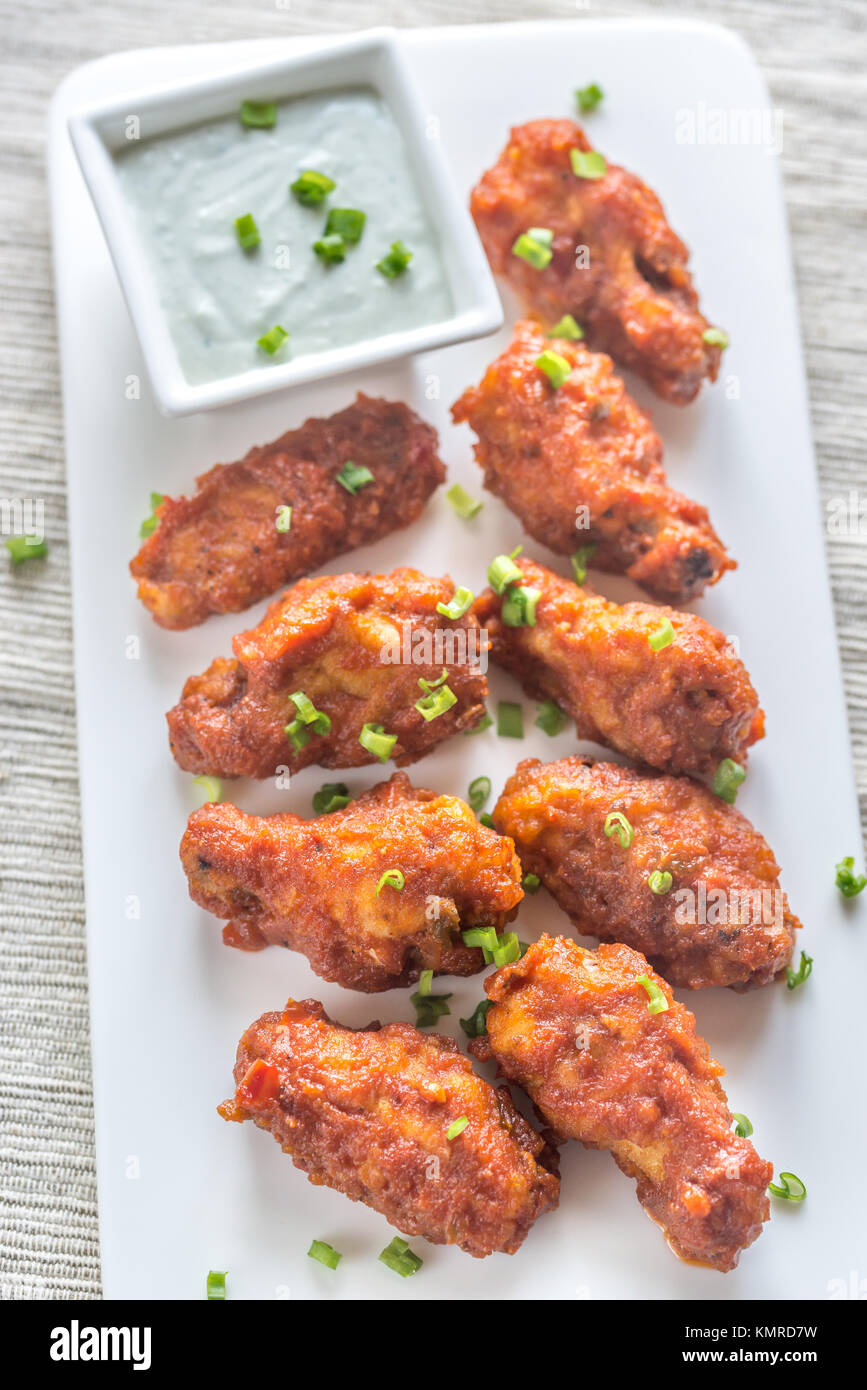 Fried chicken wings with blue cheese sauce Stock Photo - Alamy