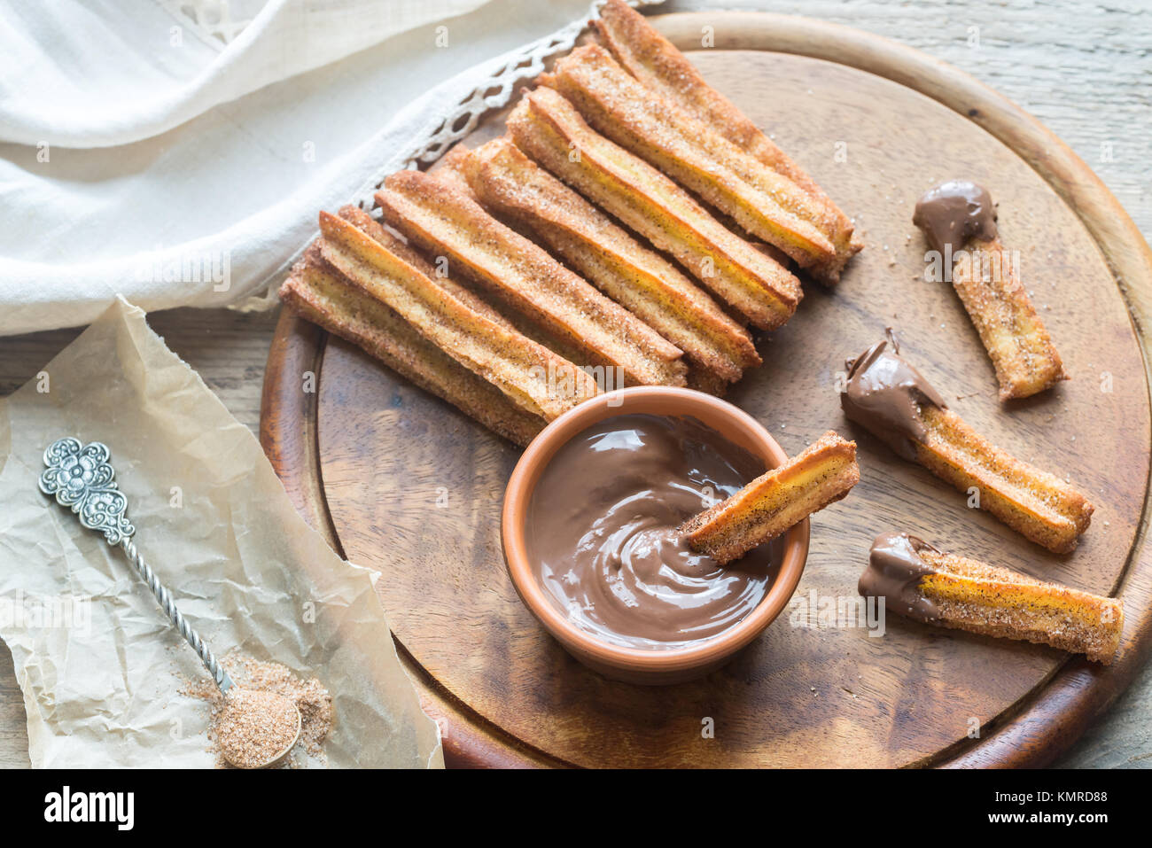 Churros - famous Spanish dessert with chocolate sauce Stock Photo - Alamy