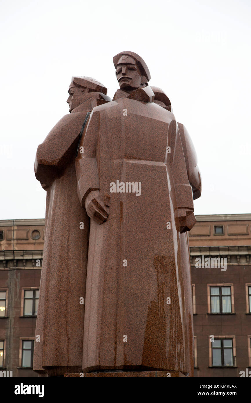 Latvian Riflemen Memorial in Riga, Latvia. The granite statue stands in ...