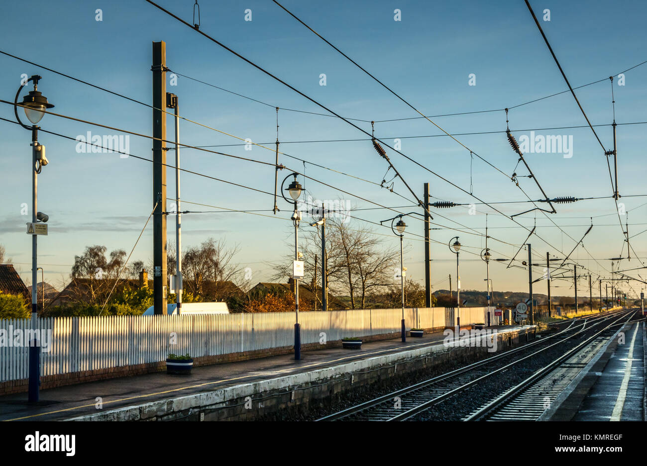Wet winter morning looking down railway tracks, Drem Station, East ...