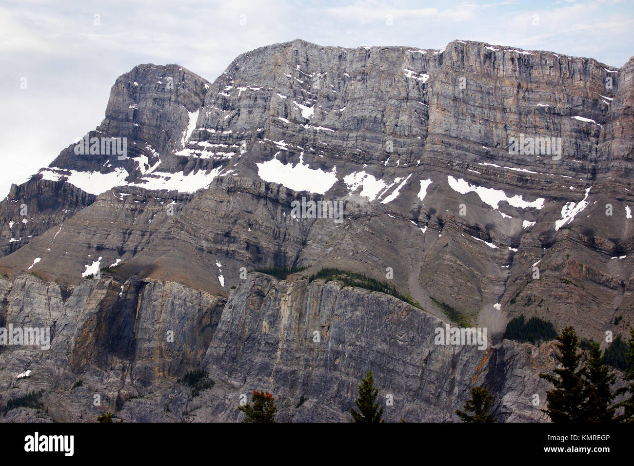 Close up of the north face of Mt Rundle with visible snow in Banff ...