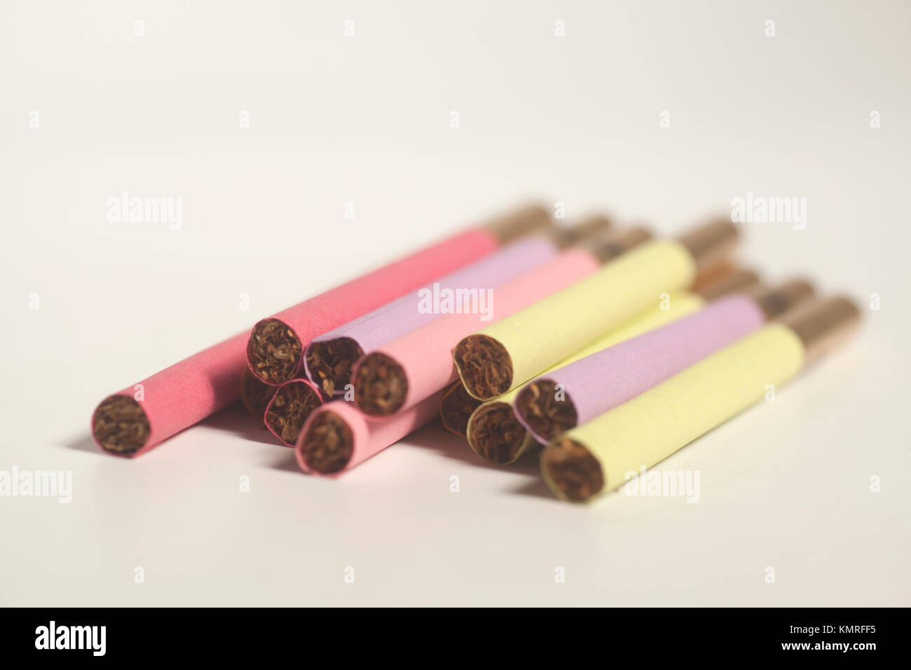 Colorful cigarettes isolated on a white background Stock Photo - Alamy