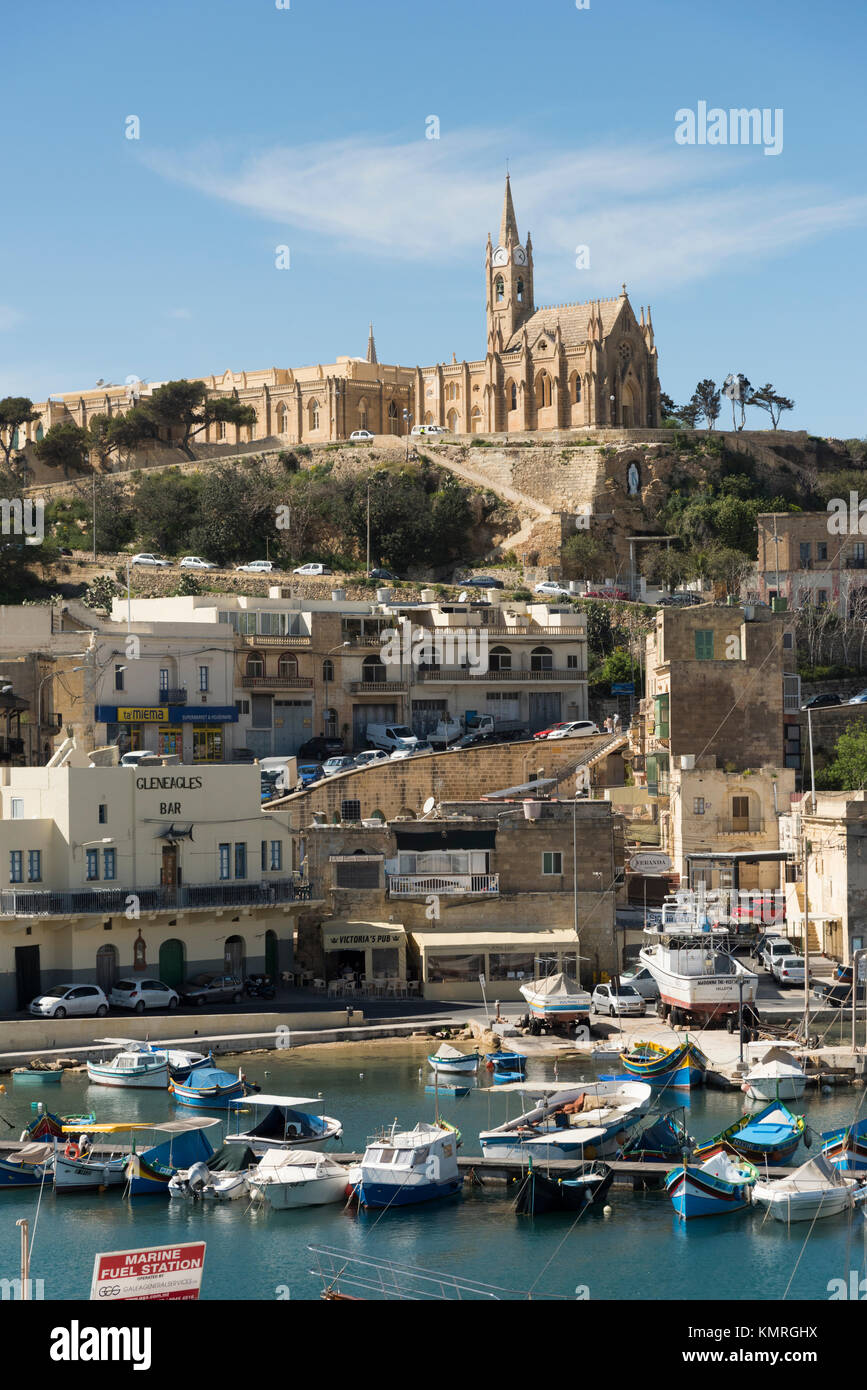 The harbour and ferry terminal at Mgarr on Gozo showing buildings anda ...