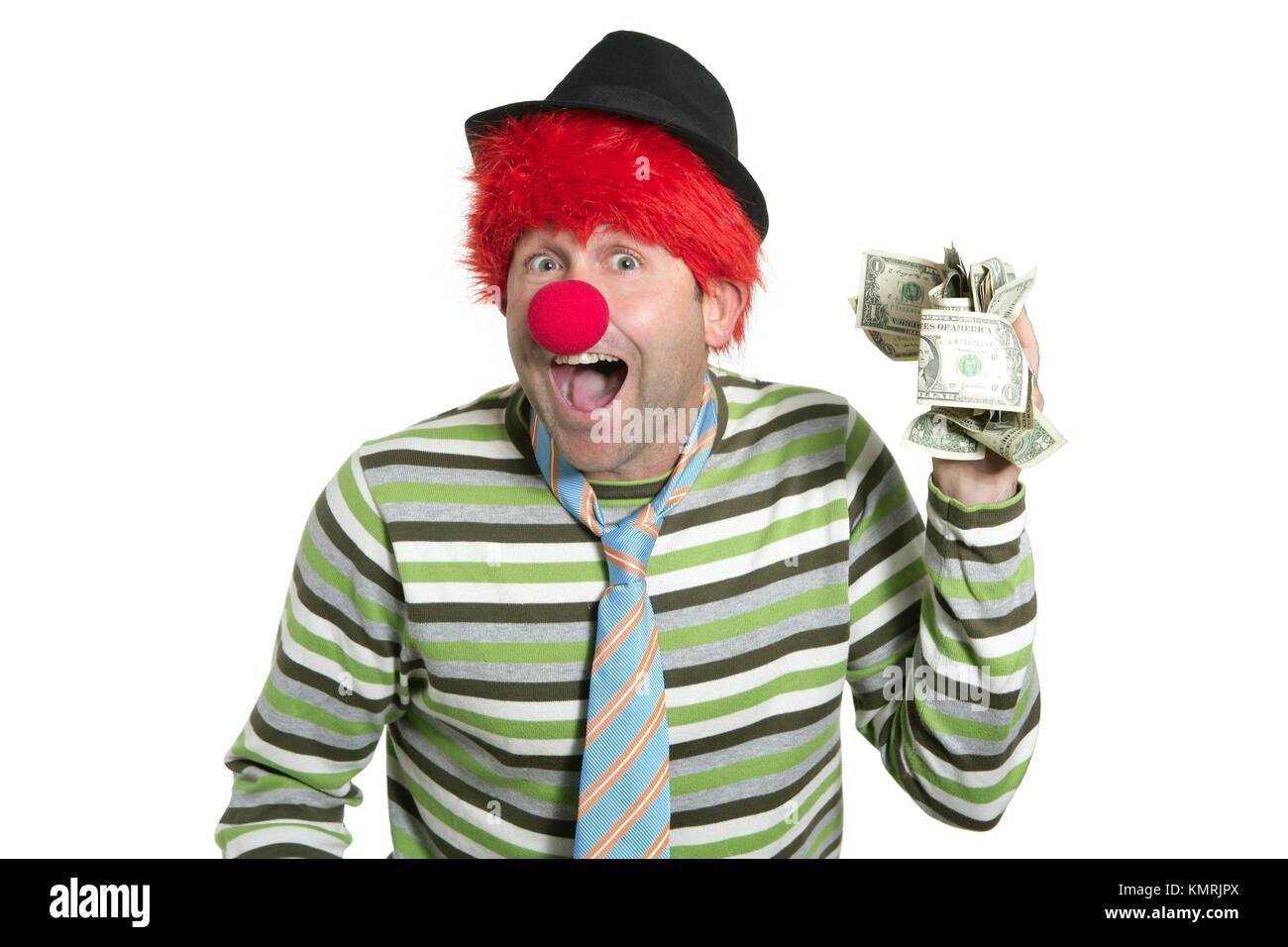 Clown with many dollar currency notes in hand humor funny business ...