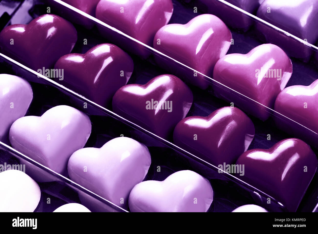 Box of chocolate Ultra Violet hearts Stock Photo - Alamy