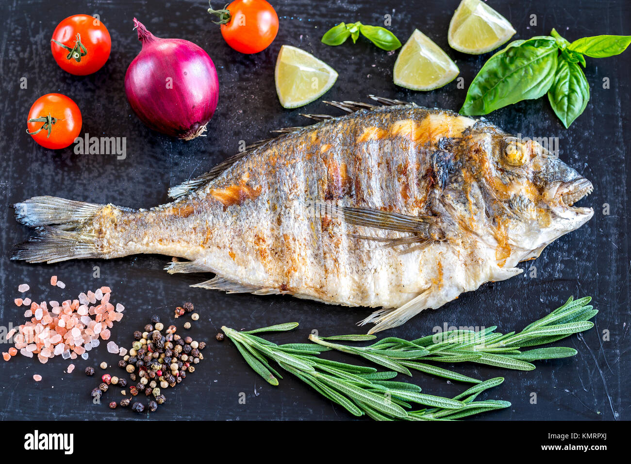 Grilled dorada fish Stock Photo - Alamy