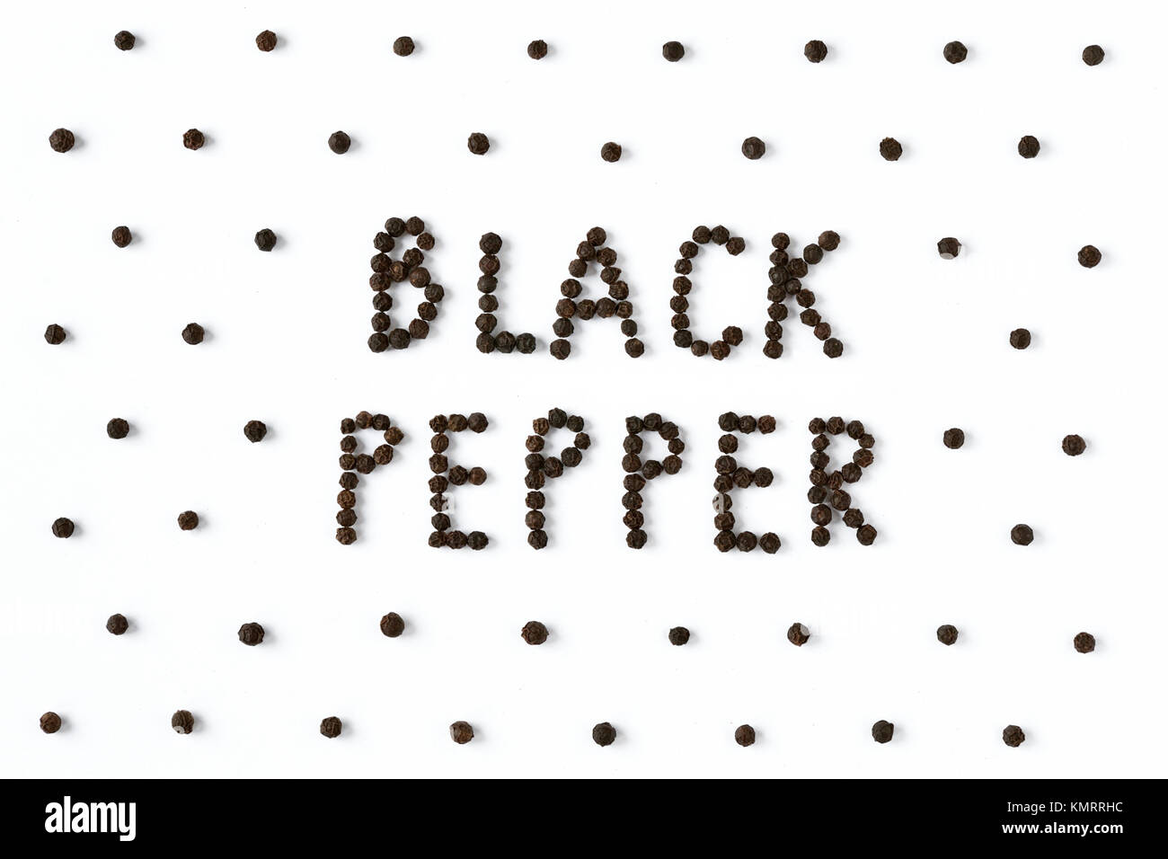 Black pepper writing on white background Stock Photo - Alamy