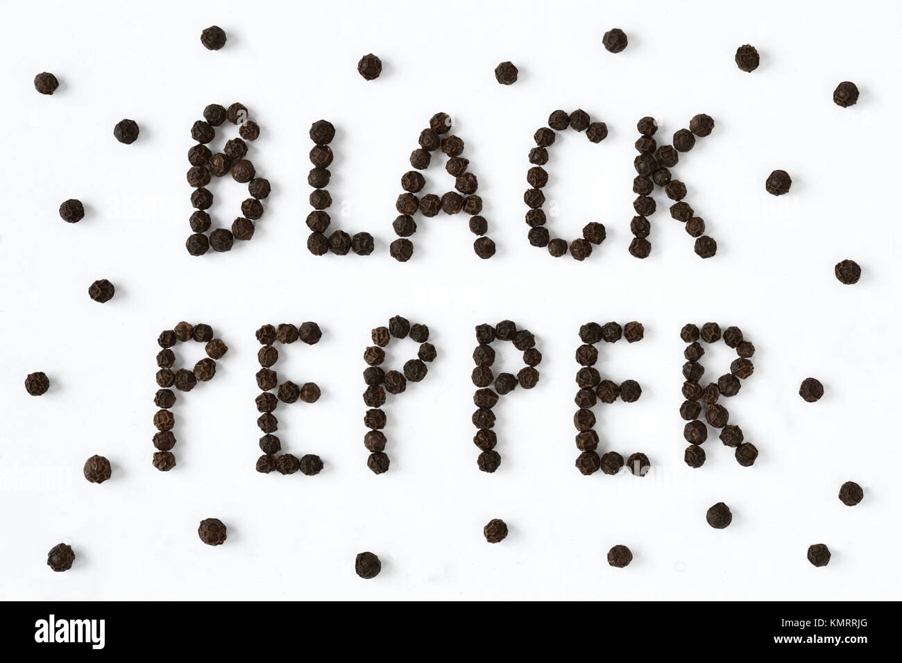 Black pepper writing on white background Stock Photo - Alamy