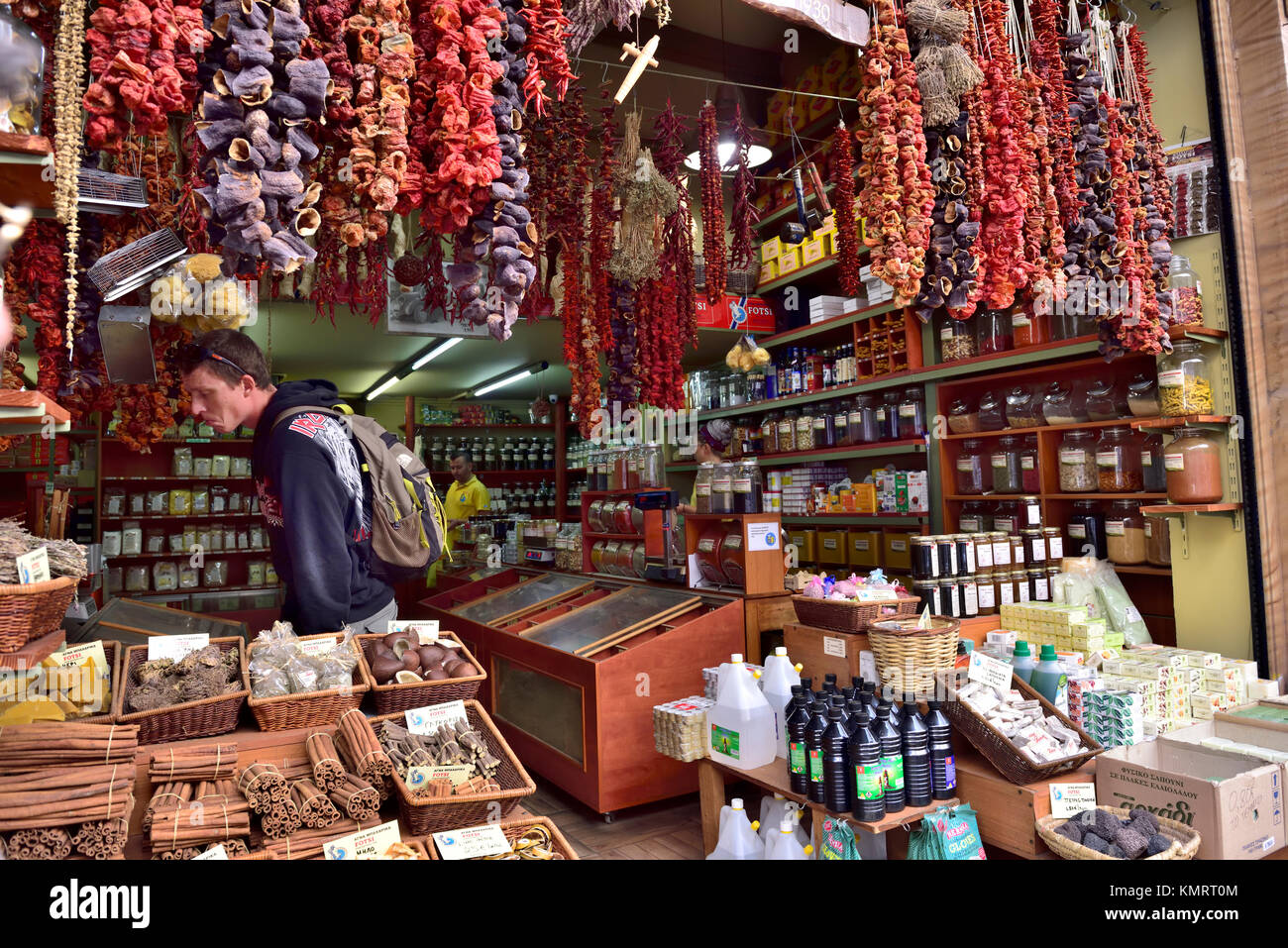 Looking into spice store with dried chillies, tomatoes, mushrooms ...