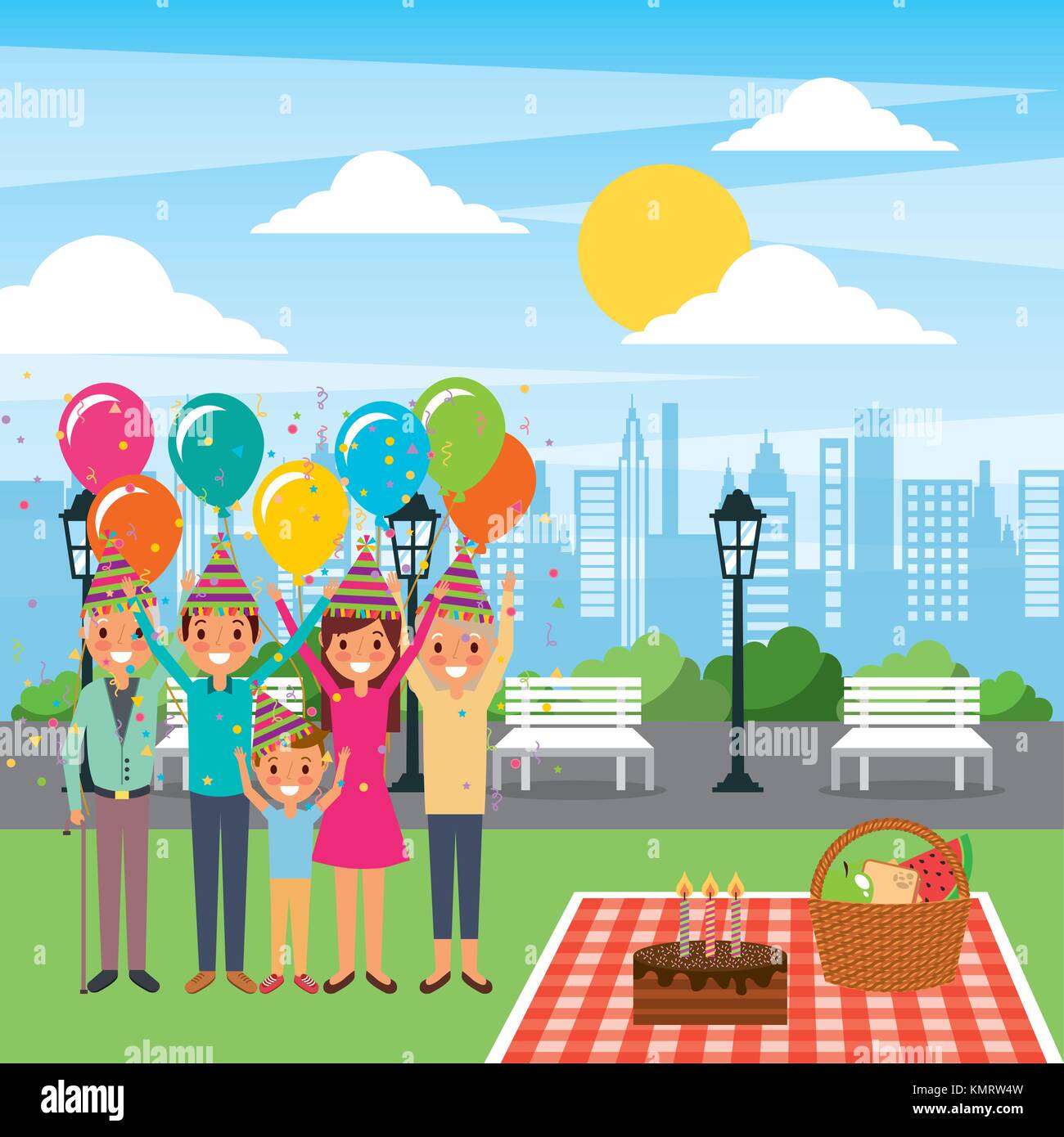 family celebrating birthday in the park with cake and decoration Stock ...