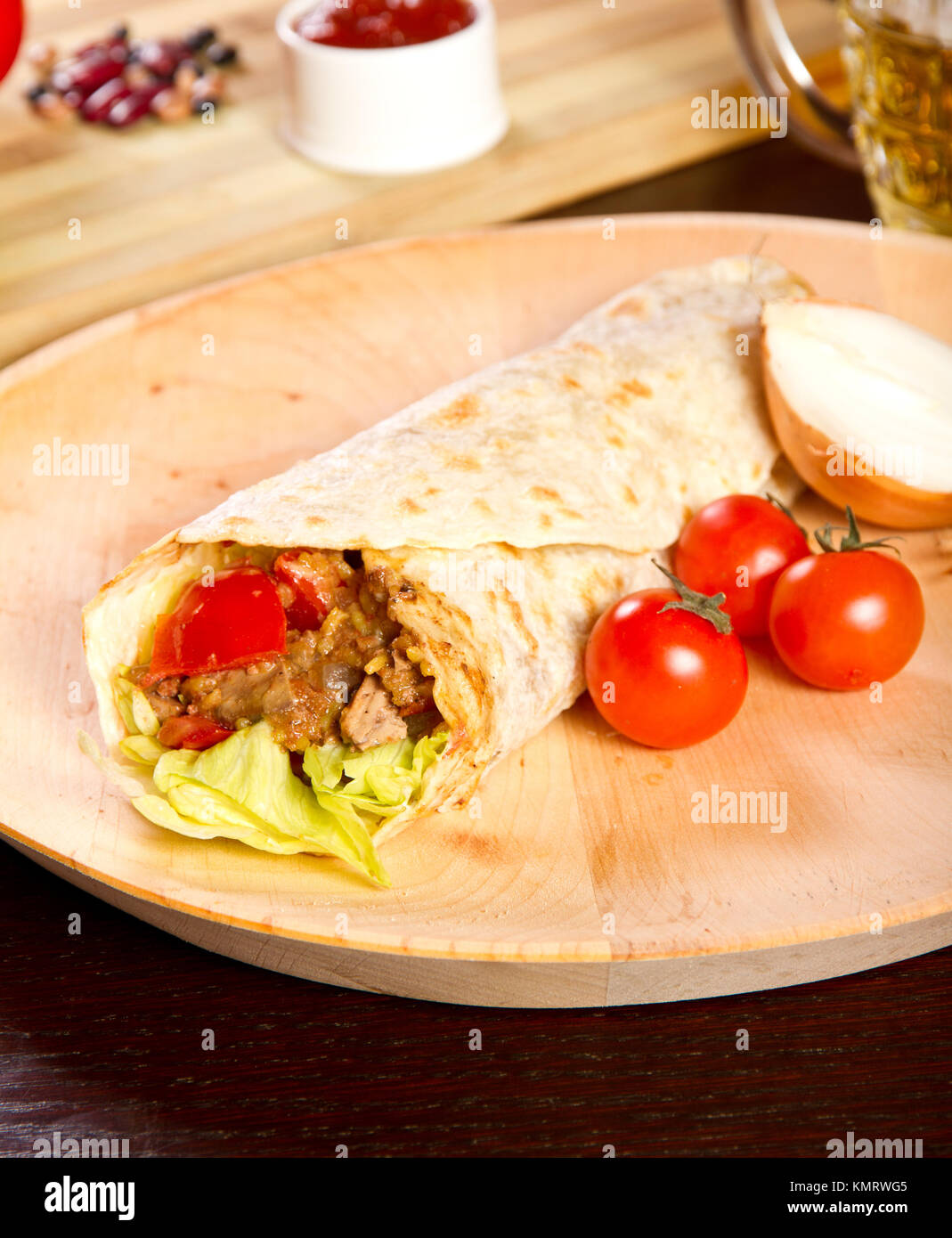 Traditional tortilla on a wooden plate Stock Photo - Alamy