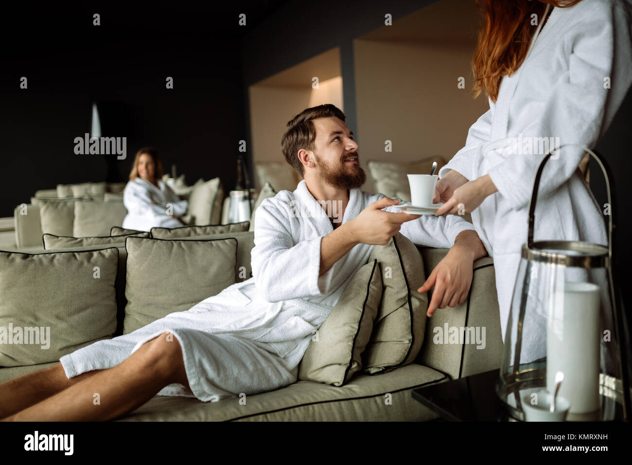 Handsome male receiving his cup of tea Stock Photo - Alamy