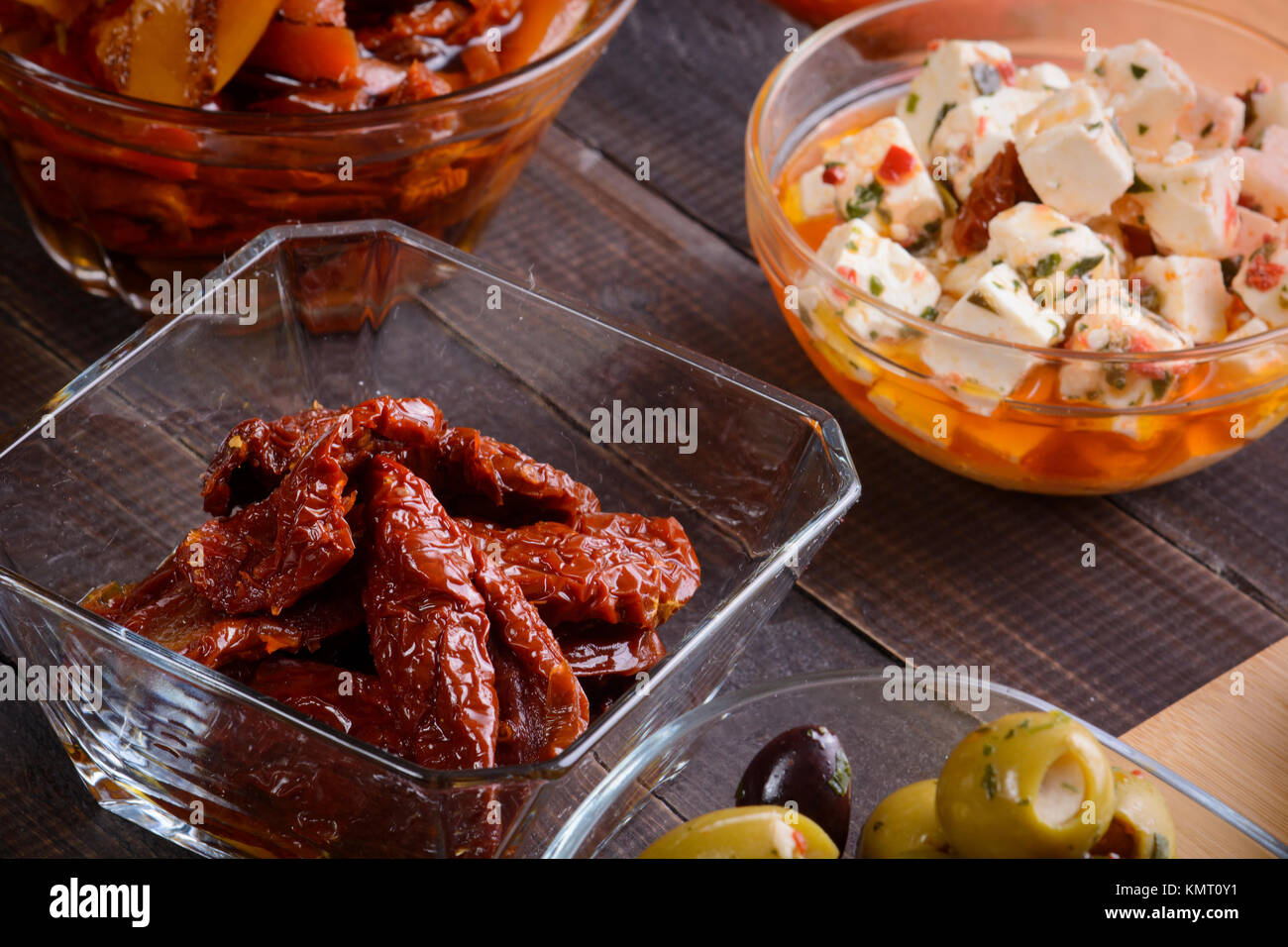 Spanish tapas starters with cheese, olives and dried tomatoes Stock ...